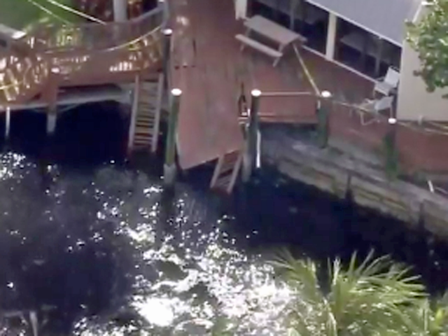 Boca dock collapse sends 13 people into water