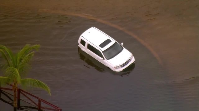 Heavy rain floods neighborhoods in Jupiter Farms
