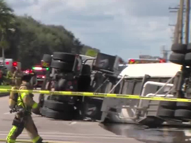 Overturned tanker spills gallons of fuel
