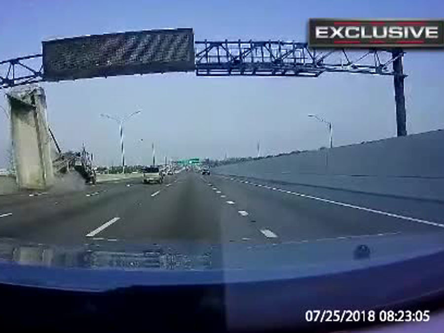 VIDEO: Dump truck collides with overhead sign in Broward County - wptv.com