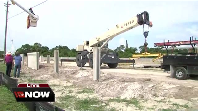 2 shocked after crane hits power line